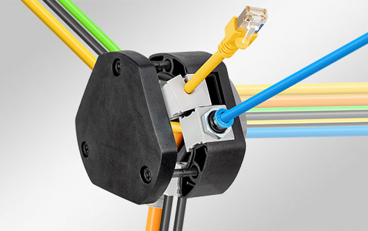 Cable entry systems for cables with connectors | icotek
